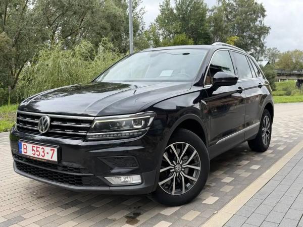 Black Volkswagen Tiguan 2016 in Rezekne, with an engine capacity of 2.00 L and mileage of 284 thousand km for 13990 €, photo 2 on AUTOMOTO.COM.LV