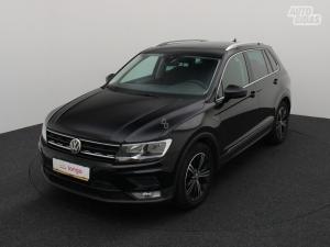 Black Volkswagen Tiguan 2017 in Vilnius, with an engine capacity of 1.40 L and mileage of 242 thousand km for 14999 €, photo  on AUTOMOTO.COM.LV