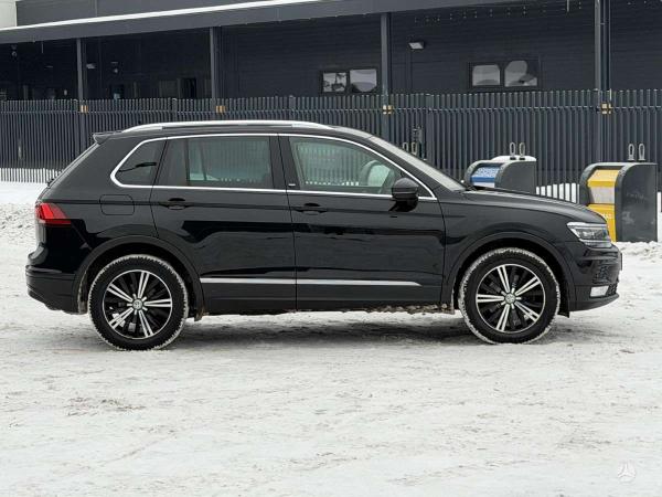 Black Volkswagen Tiguan 2017 in Jonava, with an engine capacity of 1.97 L and mileage of 290 thousand km for 15990 €, photo 11 on AUTOMOTO.COM.LV