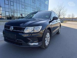 Black Volkswagen Tiguan 2017 in Panevezys, with an engine capacity of 2.00 L and mileage of 269 thousand km for 13999 €, photo 3 on AUTOMOTO.COM.LV