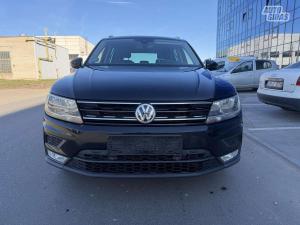 Black Volkswagen Tiguan 2017 in Panevezys, with an engine capacity of 2.00 L and mileage of 269 thousand km for 13999 €, photo 4 on AUTOMOTO.COM.LV
