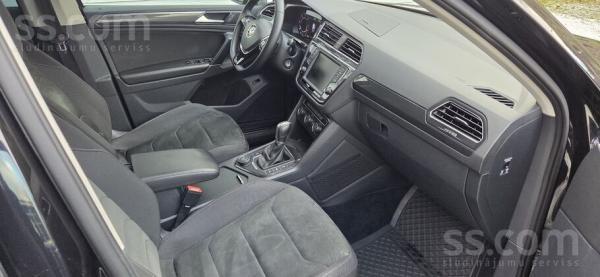 Black Volkswagen Tiguan 2017 in Riga, with an engine capacity of 2.00 L and mileage of 246 thousand km for 17000 €, photo 8 on AUTOMOTO.COM.LV