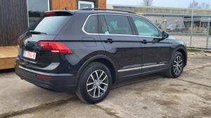 Black Volkswagen Tiguan 2017 in Riga, with an engine capacity of 1.40 L and mileage of 203 thousand km for 16990 €, photo  on AUTOMOTO.COM.LV