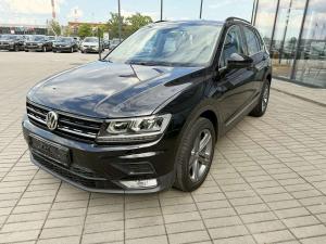 Black Volkswagen Tiguan 2017 in Kaunas, with an engine capacity of 1.40 L and mileage of 210 thousand km for 12200 €, photo  on AUTOMOTO.COM.LV