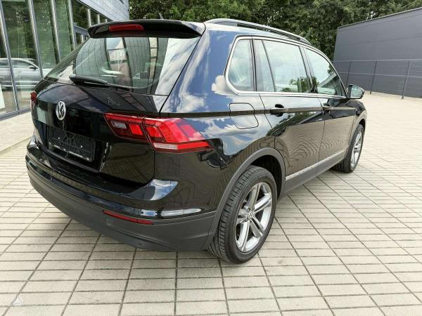 Black Volkswagen Tiguan 2017 in Kaunas, with an engine capacity of 1.40 L and mileage of 210 thousand km for 12200 €, photo 3 on AUTOMOTO.COM.LV