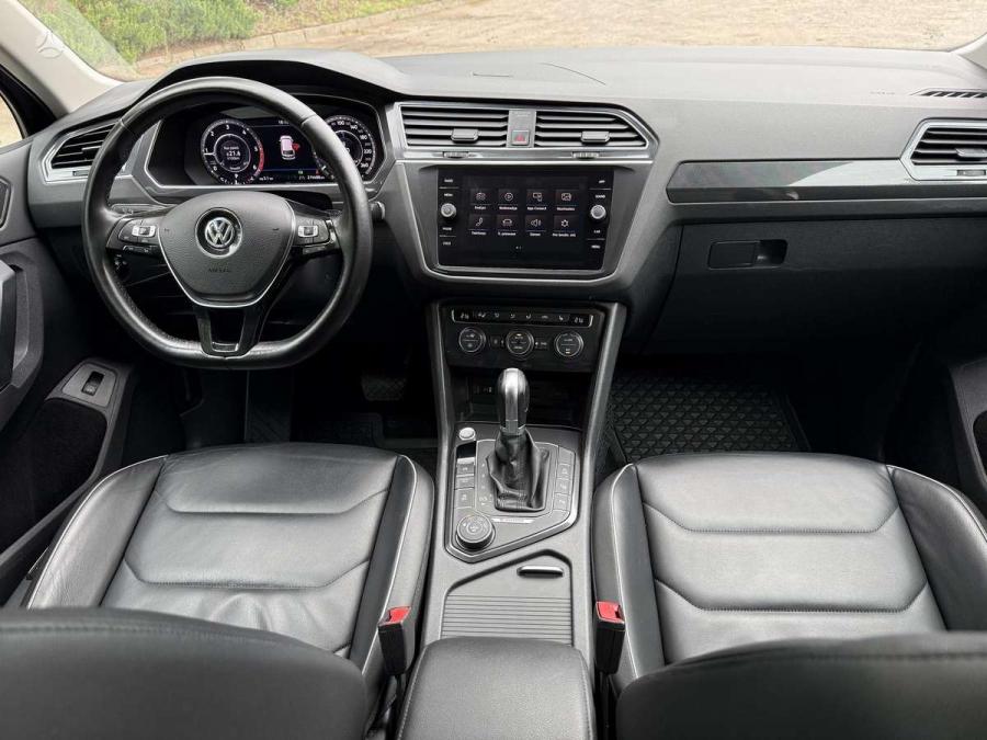 Black Volkswagen Tiguan 2017 in Prienai, with an engine capacity of 1.97 L and mileage of 274 thousand km for 14750 €, photo 28 on AUTOMOTO.COM.LV