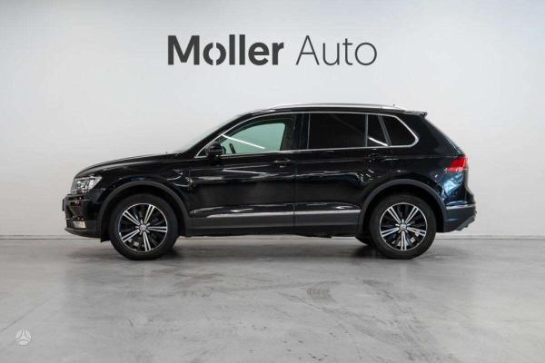 Black Volkswagen Tiguan 2017 in Vilnius, with an engine capacity of 2.00 L and mileage of 119 thousand km for 18900 €, photo 2 on AUTOMOTO.COM.LV