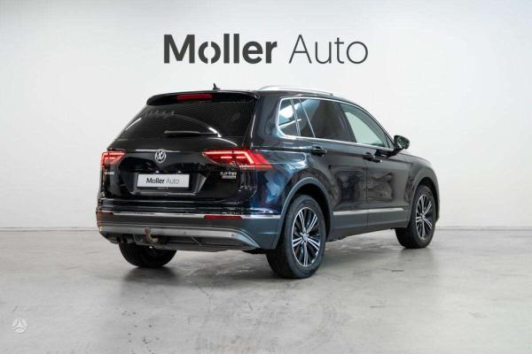 Black Volkswagen Tiguan 2017 in Vilnius, with an engine capacity of 2.00 L and mileage of 119 thousand km for 18900 €, photo 3 on AUTOMOTO.COM.LV
