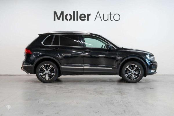 Black Volkswagen Tiguan 2017 in Vilnius, with an engine capacity of 2.00 L and mileage of 119 thousand km for 18900 €, photo 4 on AUTOMOTO.COM.LV