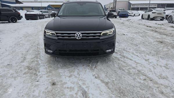 Black Volkswagen Tiguan 2018 in Siauliai, with an engine capacity of 1.98 L and mileage of 80 thousand km for 14900 €, photo 1 on AUTOMOTO.COM.LV