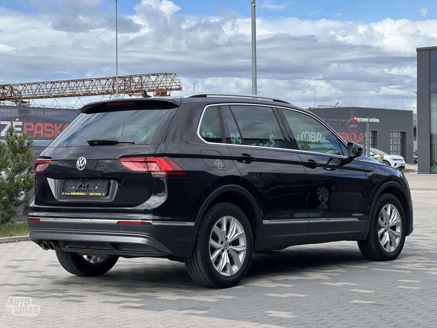 Black Volkswagen Tiguan 2018 in Siauliai, with an engine capacity of 2.00 L and mileage of 269 thousand km for 16500 €, photo 8 on AUTOMOTO.COM.LV