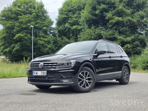 Black Volkswagen Tiguan 2019 in Riga, with an engine capacity of 2.00 L and mileage of 143 thousand km for 17850 €, photo 1 on AUTOMOTO.COM.LV