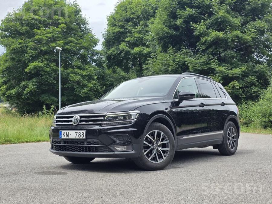 Black Volkswagen Tiguan 2019 in Riga, with an engine capacity of 2.00 L and mileage of 143 thousand km for 17850 €, photo 1 on AUTOMOTO.COM.LV