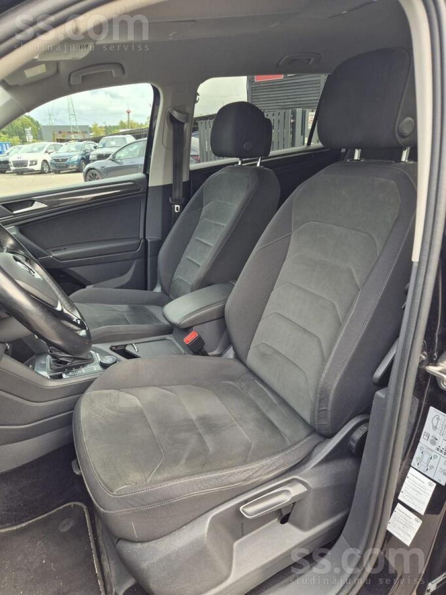 Black Volkswagen Tiguan 2019 in Riga, with an engine capacity of 2.00 L and mileage of 253 thousand km for 18490 €, photo 13 on AUTOMOTO.COM.LV