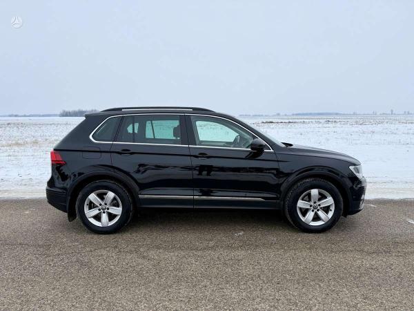 Black Volkswagen Tiguan 2020 in Vilkaviskis, with an engine capacity of 1.97 L and mileage of 265 thousand km for 16800 €, photo 5 on AUTOMOTO.COM.LV