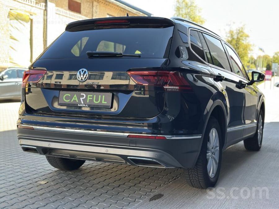 Black Volkswagen Tiguan 2020 in Riga, with an engine capacity of 2.00 L and mileage of 169 thousand km for 19500 €, photo 7 on AUTOMOTO.COM.LV