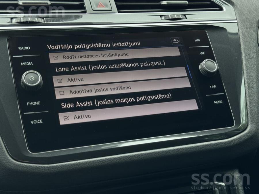 Black Volkswagen Tiguan 2020 in Valmiera, with an engine capacity of 1.50 L and mileage of 164 thousand km for 18200 €, photo 21 on AUTOMOTO.COM.LV