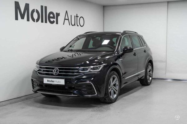 Black Volkswagen Tiguan 2021 in Vilnius, with an engine capacity of 1.50 L and mileage of 65 thousand km for 27800 €, photo 1 on AUTOMOTO.COM.LV