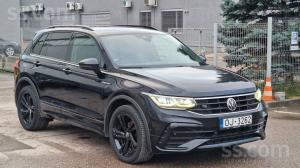 Black Volkswagen Tiguan 2021 in Riga, with an engine capacity of 2.00 L and mileage of 236 thousand km for 23500 €, photo  on AUTOMOTO.COM.LV