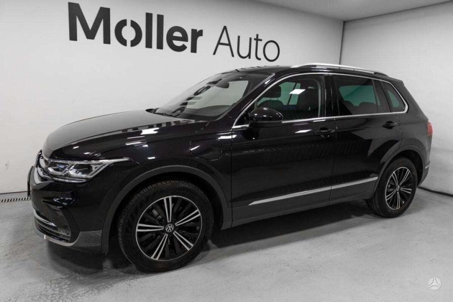 Black Volkswagen Tiguan 2021 in Vilnius, with an engine capacity of 1.40 L and mileage of 101 thousand km for 29350 €, photo 2 on AUTOMOTO.COM.LV