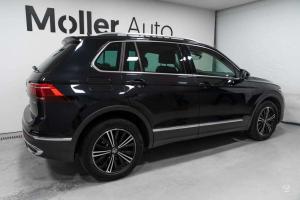 Black Volkswagen Tiguan 2021 in Vilnius, with an engine capacity of 1.40 L and mileage of 101 thousand km for 29350 €, photo 4 on AUTOMOTO.COM.LV