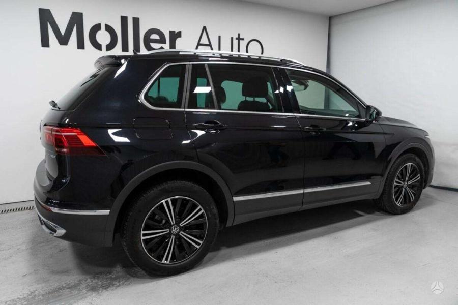 Black Volkswagen Tiguan 2021 in Vilnius, with an engine capacity of 1.40 L and mileage of 101 thousand km for 29350 €, photo 4 on AUTOMOTO.COM.LV