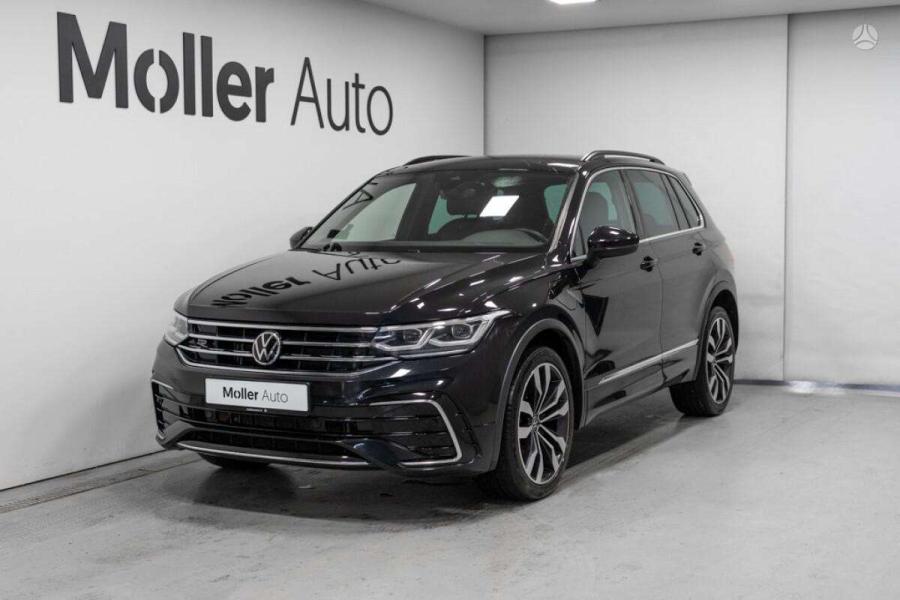 Black Volkswagen Tiguan 2021 in Vilnius, with an engine capacity of 1.40 L and mileage of 97 thousand km for 29800 €, photo 1 on AUTOMOTO.COM.LV