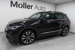 Black Volkswagen Tiguan 2021 in Vilnius, with an engine capacity of 1.40 L and mileage of 97 thousand km for 29800 €, photo 2 on AUTOMOTO.COM.LV