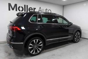 Black Volkswagen Tiguan 2021 in Vilnius, with an engine capacity of 1.40 L and mileage of 97 thousand km for 29200 €, photo 3 on AUTOMOTO.COM.LV