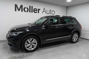 Black Volkswagen Tiguan 2021 in Vilnius, with an engine capacity of 1.40 L and mileage of 103 thousand km for 26900 €, photo 2 on AUTOMOTO.COM.LV