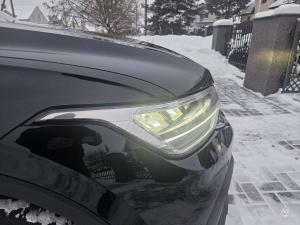 Black Volkswagen Tiguan 2021 in Radviliskis, with an engine capacity of 1.97 L and mileage of 145 thousand km for 21600 €, photo 8 on AUTOMOTO.COM.LV