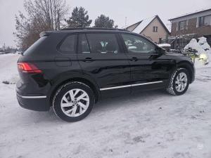 Black Volkswagen Tiguan 2021 in Radviliskis, with an engine capacity of 1.97 L and mileage of 145 thousand km for 21600 €, photo 11 on AUTOMOTO.COM.LV