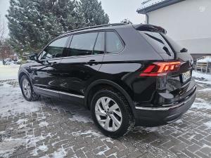 Black Volkswagen Tiguan 2021 in Radviliskis, with an engine capacity of 1.97 L and mileage of 145 thousand km for 21600 €, photo 12 on AUTOMOTO.COM.LV