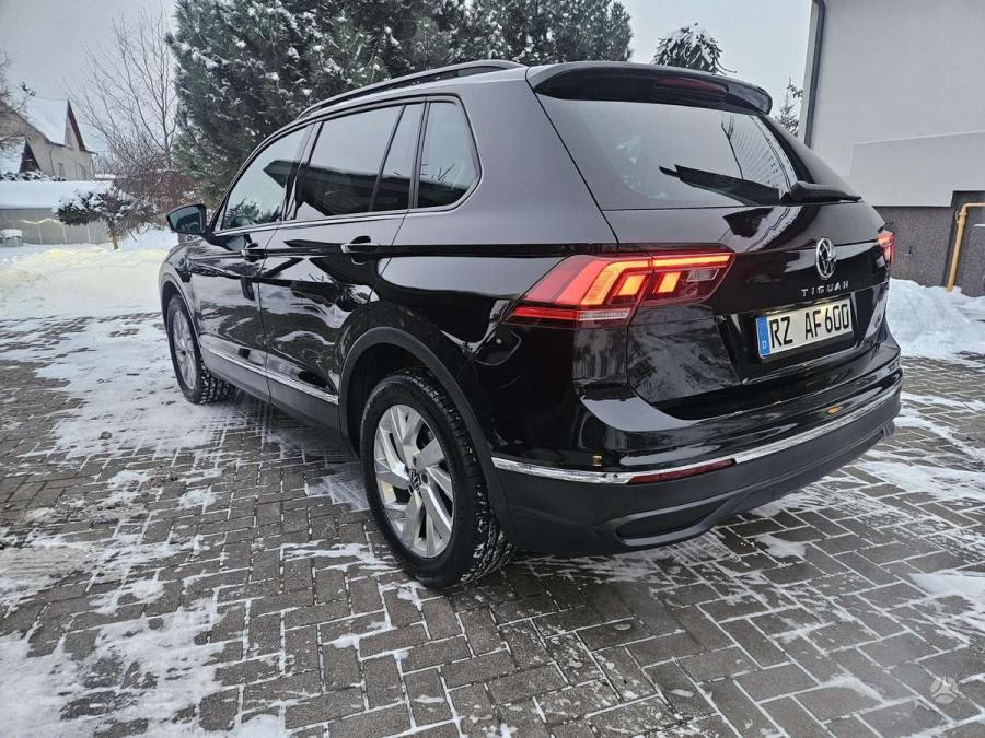 Black Volkswagen Tiguan 2021 in Radviliskis, with an engine capacity of 1.97 L and mileage of 145 thousand km for 21600 €, photo 14 on AUTOMOTO.COM.LV