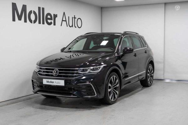 Black Volkswagen Tiguan 2021 in Vilnius, with an engine capacity of 1.40 L and mileage of 97 thousand km for 28650 €, photo 1 on AUTOMOTO.COM.LV