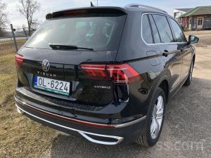 Black Volkswagen Tiguan 2021 in Riga, with an engine capacity of 1.40 L and mileage of 161 thousand km for 21350 €, photo 5 on AUTOMOTO.COM.LV