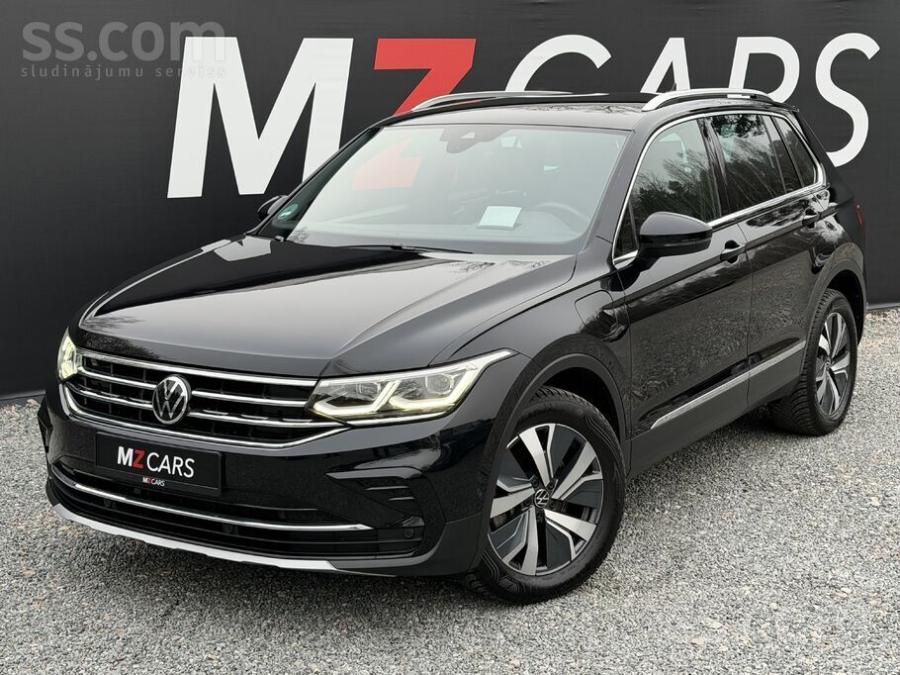 Black Volkswagen Tiguan 2021 in Riga, with an engine capacity of 1.40 L and mileage of 151 thousand km for 23750 €, photo 1 on AUTOMOTO.COM.LV