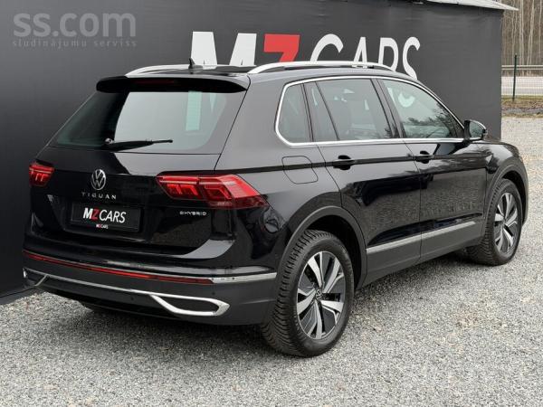 Black Volkswagen Tiguan 2021 in Riga, with an engine capacity of 1.40 L and mileage of 151 thousand km for 23750 €, photo 3 on AUTOMOTO.COM.LV