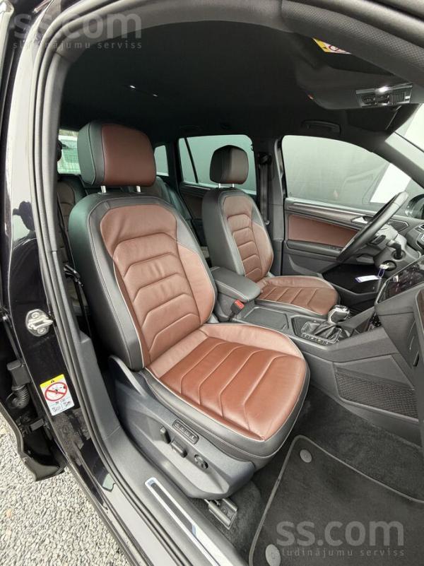 Black Volkswagen Tiguan 2021 in Riga, with an engine capacity of 1.40 L and mileage of 151 thousand km for 23750 €, photo 5 on AUTOMOTO.COM.LV