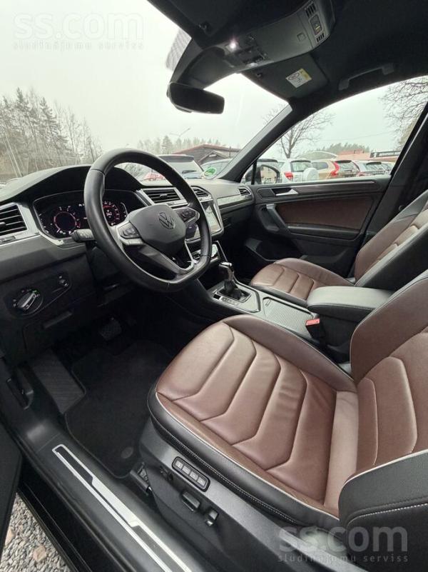Black Volkswagen Tiguan 2021 in Riga, with an engine capacity of 1.40 L and mileage of 151 thousand km for 23750 €, photo 7 on AUTOMOTO.COM.LV