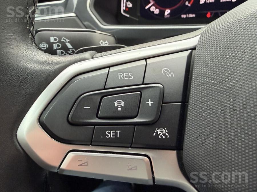 Black Volkswagen Tiguan 2021 in Riga, with an engine capacity of 1.40 L and mileage of 151 thousand km for 23750 €, photo 16 on AUTOMOTO.COM.LV