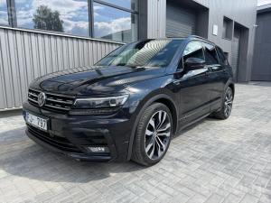 Black Volkswagen Tiguan 2021 in Riga, with an engine capacity of 2.00 L and mileage of 170 thousand km for 22999 €, photo  on AUTOMOTO.COM.LV