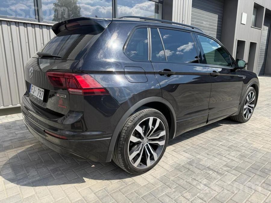 Black Volkswagen Tiguan 2021 in Riga, with an engine capacity of 2.00 L and mileage of 170 thousand km for 22999 €, photo 5 on AUTOMOTO.COM.LV