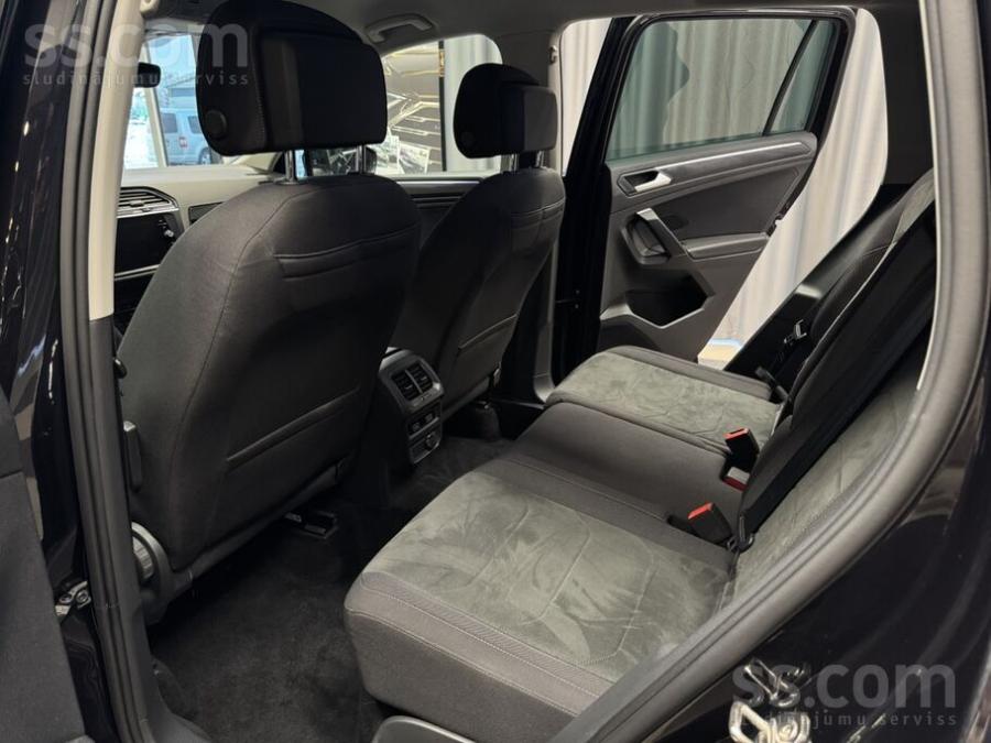 Black Volkswagen Tiguan 2021 in Riga, with an engine capacity of 2.00 L and mileage of 178 thousand km for 21490 €, photo 31 on AUTOMOTO.COM.LV