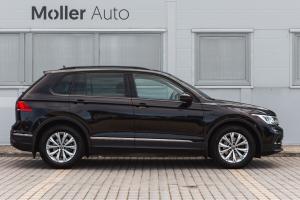 Black Volkswagen Tiguan 2021 in Ventspils, with an engine capacity of 1.50 L and mileage of 69 thousand km for 23900 €, photo 6 on AUTOMOTO.COM.LV