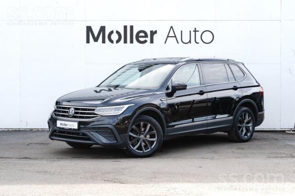 Black Volkswagen Tiguan 2022 in Riga, with an engine capacity of 2.00 L and mileage of 80 thousand km for 29500 €, photo 1 on AUTOMOTO.COM.LV