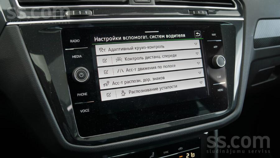 Black Volkswagen Tiguan 2022 in Riga, with an engine capacity of 1.50 L and mileage of 154 thousand km for 25450 €, photo 23 on AUTOMOTO.COM.LV