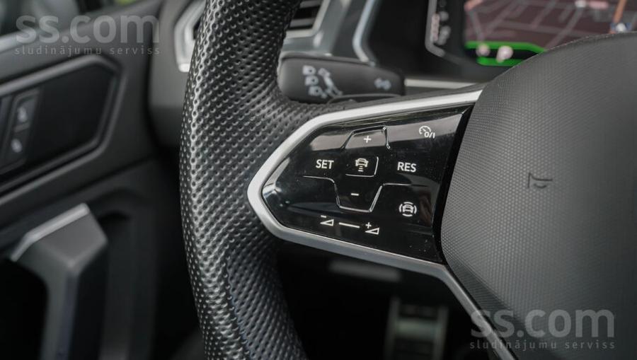 Black Volkswagen Tiguan 2022 in Riga, with an engine capacity of 1.50 L and mileage of 154 thousand km for 25450 €, photo 26 on AUTOMOTO.COM.LV