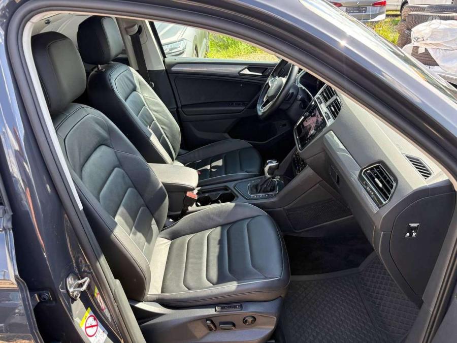 Black Volkswagen Tiguan 2022 in Vilnius, with an engine capacity of 1.40 L and mileage of 199 thousand km for 17700 €, photo 16 on AUTOMOTO.COM.LV