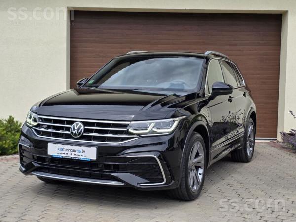 Black Volkswagen Tiguan 2022 in Riga, with an engine capacity of 1.40 L and mileage of 77 thousand km for 27950 €, photo 1 on AUTOMOTO.COM.LV